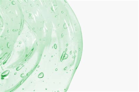 Premium Photo | Transparent cosmetic green gel on an light background
