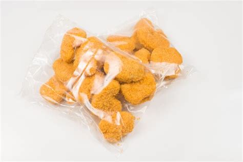 Premium Photo Packaging Nuggets On A White Background