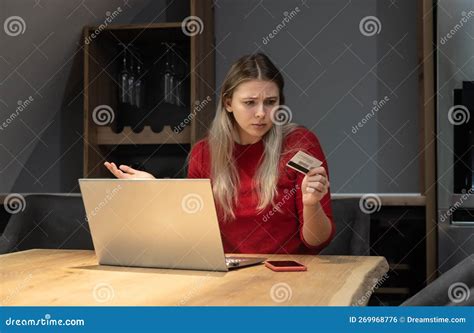 Young Shocked Frustrated Woman Holding Bank Credit Card Annoyed That She Has Reached Her Account