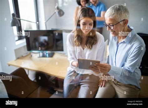 Programmer Working In A Software Developing Company Office Stock Photo