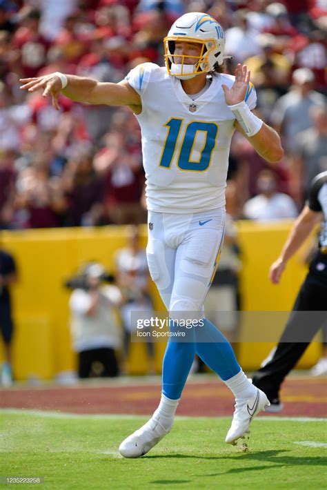 San Diego Chargers Quarterback Justin Herbert Throws A Pass During