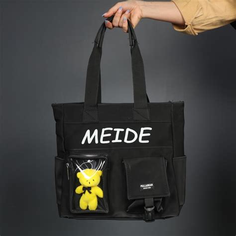 خرید و قیمت کیف زنانه دوشی مدل خرسی Meide کد 02