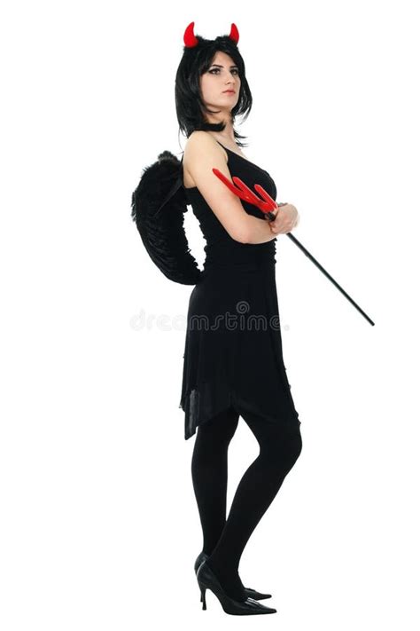 A Beautiful Woman In A Devil Costume A Demon With Horns And