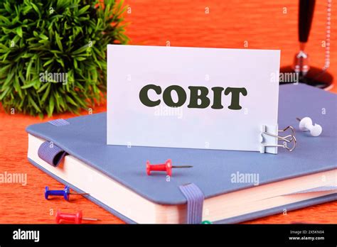 Control Objectives For Information And Related Technologies Cobit On A Business Card Standing
