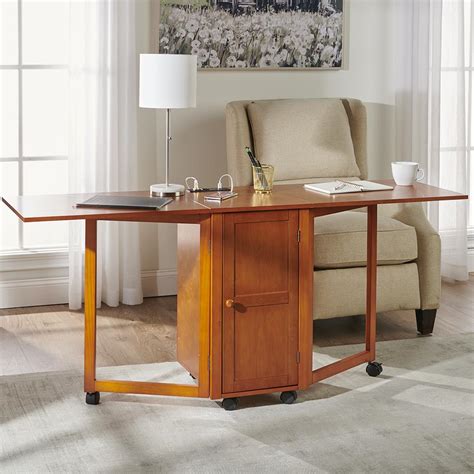 The Device Charging Dropleaf End Table Hammacher Schlemmer