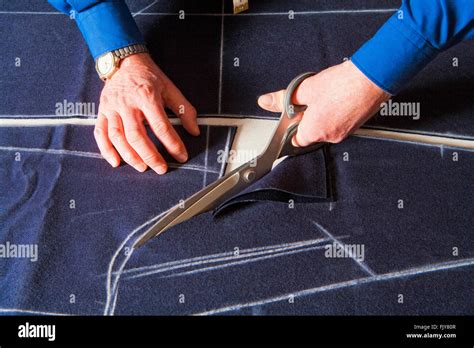 Scissors Cutting Fabric