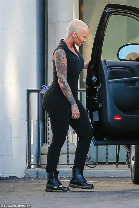 Amber Rose Is All Curves In A Skintight Black Jumpsuit After Instagram