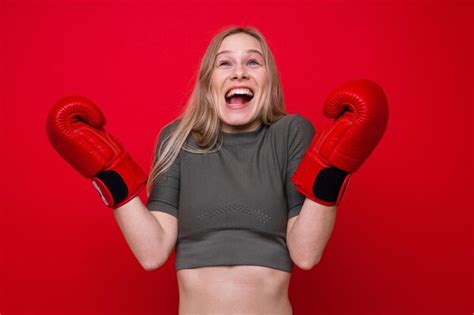 Premium Photo Sporty Young Woman In Red Boxing Gloves Having Fun