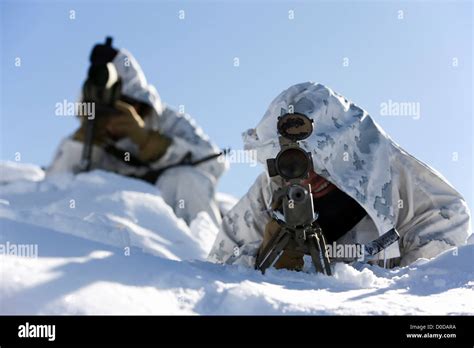 U S Marine Corps Scout Sniper And His Spotter Camouflaged In The Snow