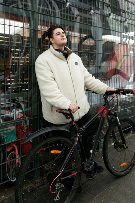 Sports Concept Young Man Spends Weekend Riding A Bike Stock Image