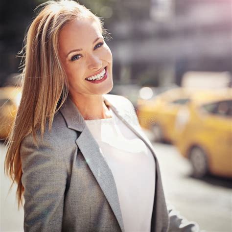 Big City Smiles Portrait Of An Attractive Young Woman In A City Street Stock Image Image Of