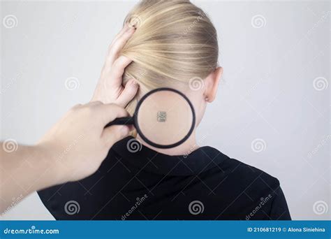 Implantation Of Chip Under The Human Skin Microchip Is Connected To The Girl Body Royalty Free