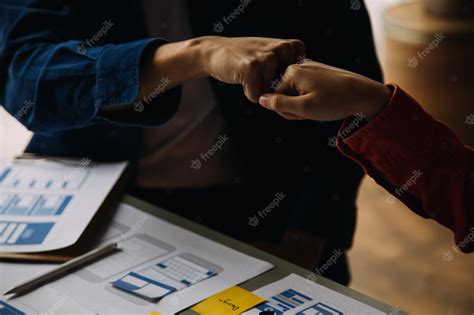 Premium Photo Close Up Ux Developer And Ui Designer Brainstorming About Mobile App Interface