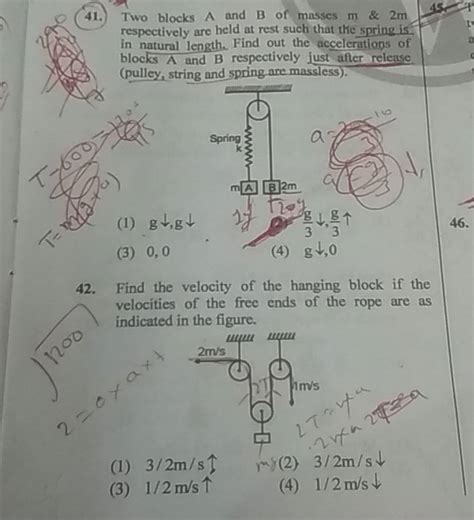 Two Blocks A And B Of Masses M 2m Respectively Are Held At Rest Such T