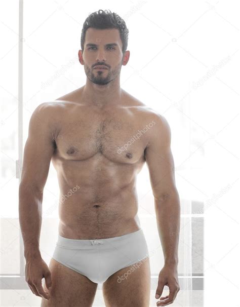 Hombre en ropa interior fotografía de stock curaphotography