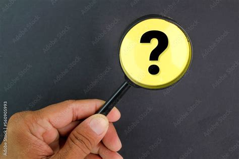 Magnifying Glass And Question Mark The Concept Of Finding A Solution