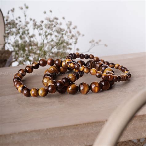 Tiger Eye Bracelet Buy Online Tiger Eye Crystal Bracelet Shubhanjali