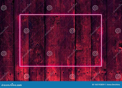 Neon Light Fluorescent Frame On Wooden Background Stock Image Image
