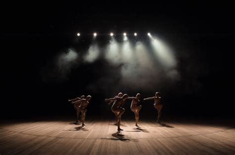 Premium Photo A Group Of Small Ballet Dancers Rehearses On Stage With
