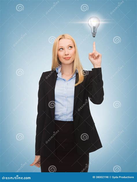 Woman Pointing At Light Bulb Stock Photo Image Of Mind Electricity 38002198
