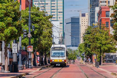 Close Up Of A Dart Light Rail Train Passing Through Downtown Editorial