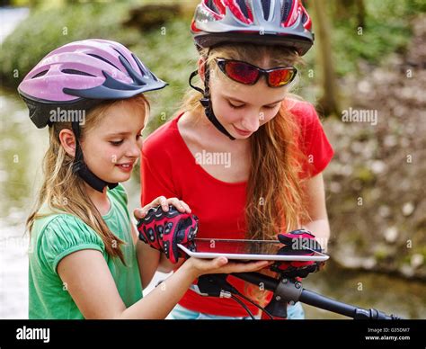 Bikes Cycling Girl Wearing Helmet In Cycling Sitting Near Bicycle And