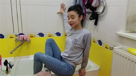 Girl Wear Jeans And Fully Clothes Wetlook