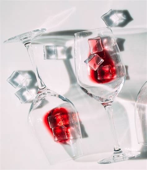 Premium Photo Glasses Of Red Wine With Shadow