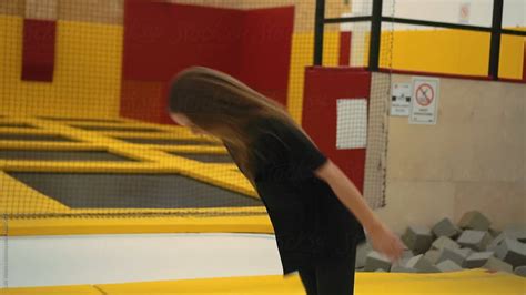 Graceful Girl Jumping In The Trampoline By Stocksy Contributor Luis