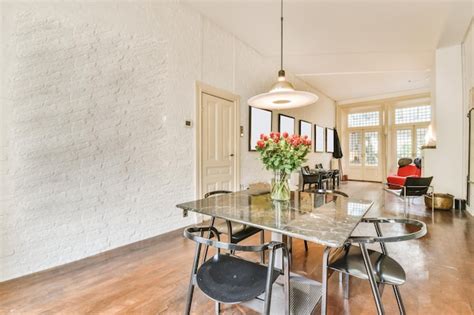 Premium Photo Dining Room With A Small Black Table