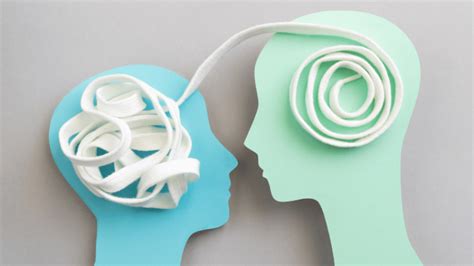 Two Paper Heads Linked Together By White Shoelace Representing Relationships And Sex Education