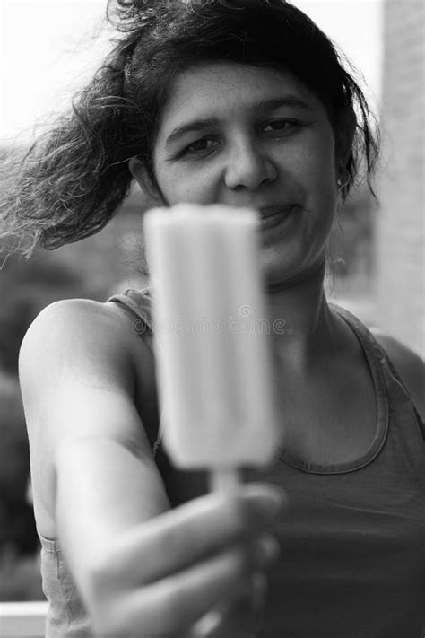A Woman Holding A Popsicle Stick Stock Image Image Of Face Adult