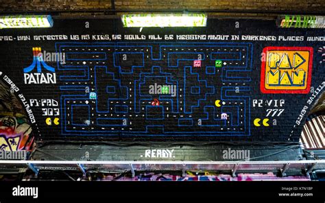 Graffiti Of The Computer Game Pac Man In A Pedestrian Tunnel London
