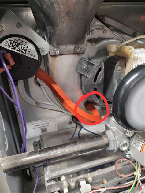 Port For The Pressure Switch On The Inducer Housing Has Gotten Clogged With Something Hard And