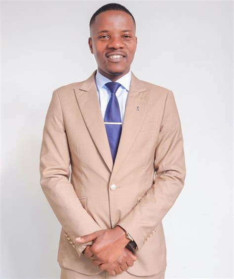 Confident Classy Ethnic Man Standing In Sunny Countryside · Free Stock