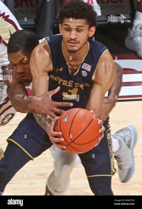 Florida State Guard Trent Forrest Back Tries To Steal The Ball From