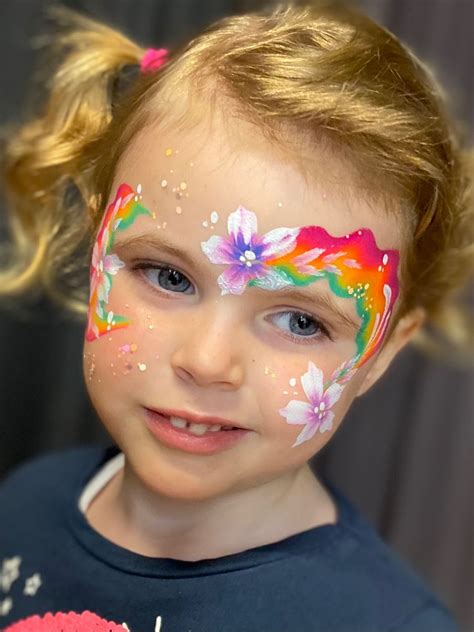 Rainbow and flowers | Rainbow flowers, Carnival face paint, Rainbow pin