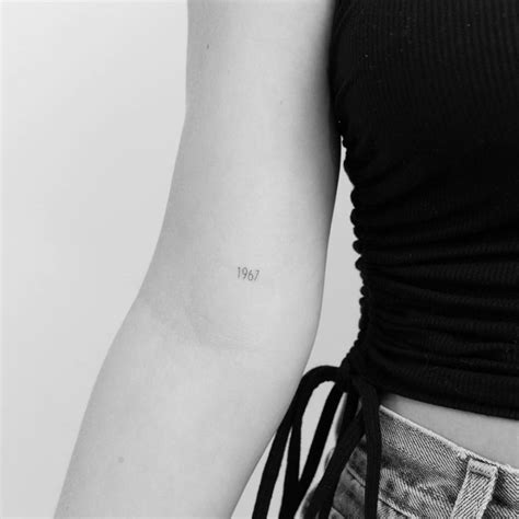 Lettering Tattoo On The Inner Arm