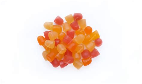 Premium Photo Closeup Texture Of Orange And Yellow Multivitamin Gummies In The Form Of Bears