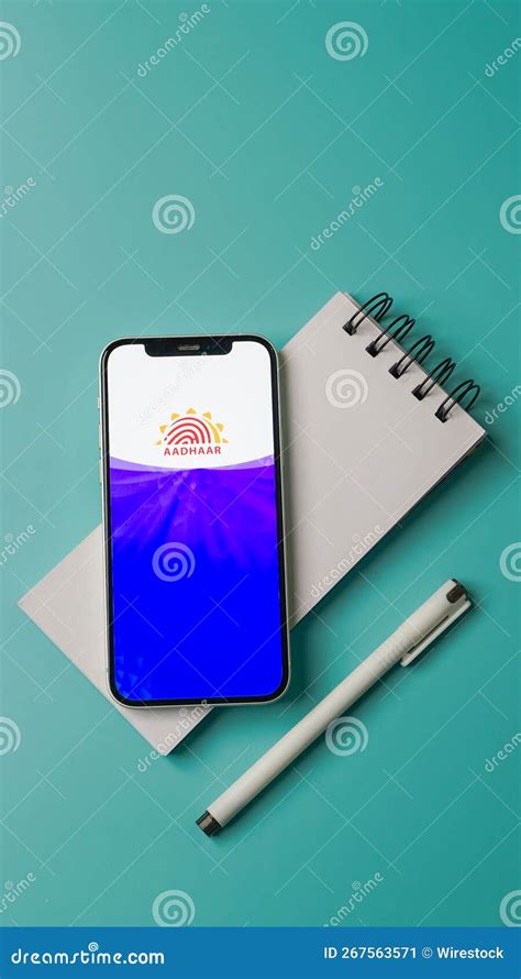 Aadhaar Or Maadhaar Is A Mobile Phone App On Colour Background