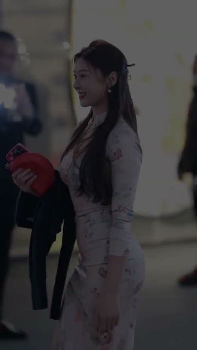A Beautiful Girl In Colorful Clothes Effortlessly Merges Into The