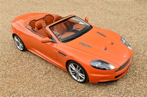 This Outrageous Orange Collection Of Aston Martins Can Now Be Yours