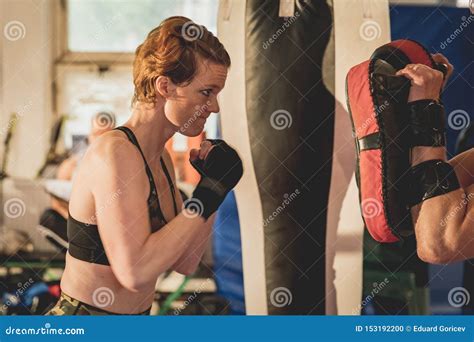 Gorgeous Woman Mma Fighter In Gym During Training Preparing For A