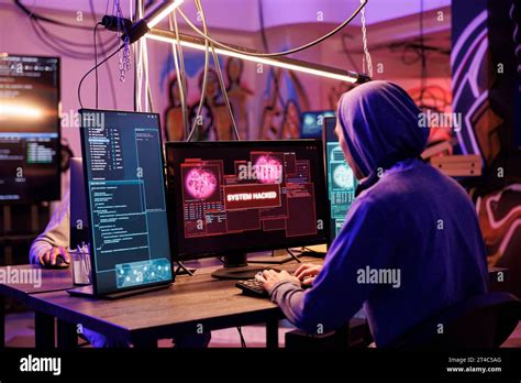 Criminal In Hood Successfully Hacking Into Computer System In Abandoned