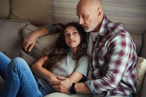 Worried Daughter Looking At Her Sad Dad Stock Image Image Of Serious