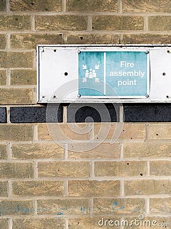 Assembly Point Sign On Brick Wall Stock Image CartoonDealer Com