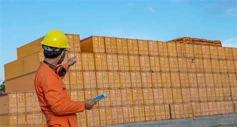 Premium Photo Engineer Working At Place For Keep Containerforeman Wearing Hardhat Standing At