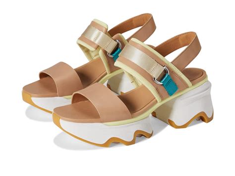 Sorel Kinetic Impact Slingback Heel Sandal In Metallic Lyst