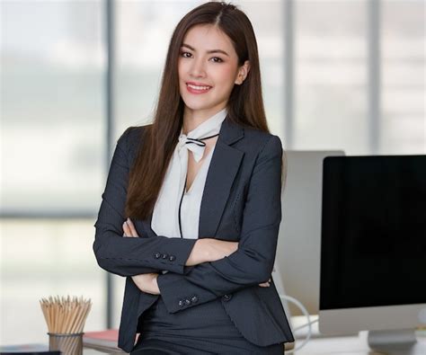 Premium Photo Young Attractive Asian Woman In Black Business Suit