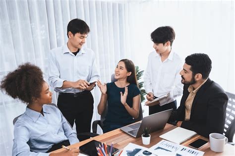 Premium Photo Multiracial Analyst Team Use Bi Dashboard For Data Analysis With Laptop Concord